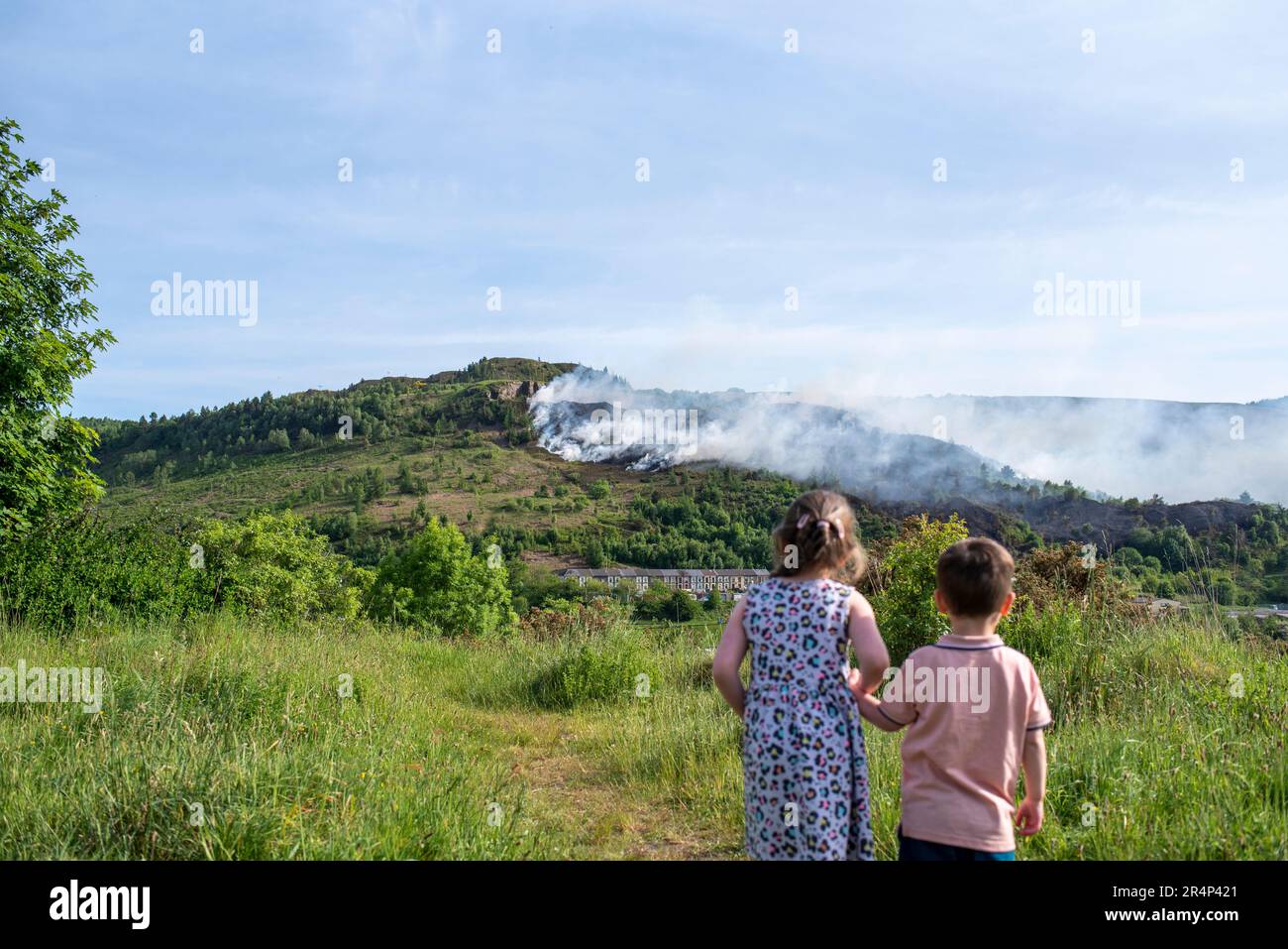 Gelli, Wales, 29 May, 2023: Two children watch on as Fire fighters ...
