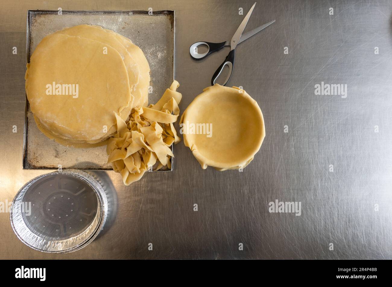 Deliciously crafted quiche shells ready to be filled, neatly arranged ...
