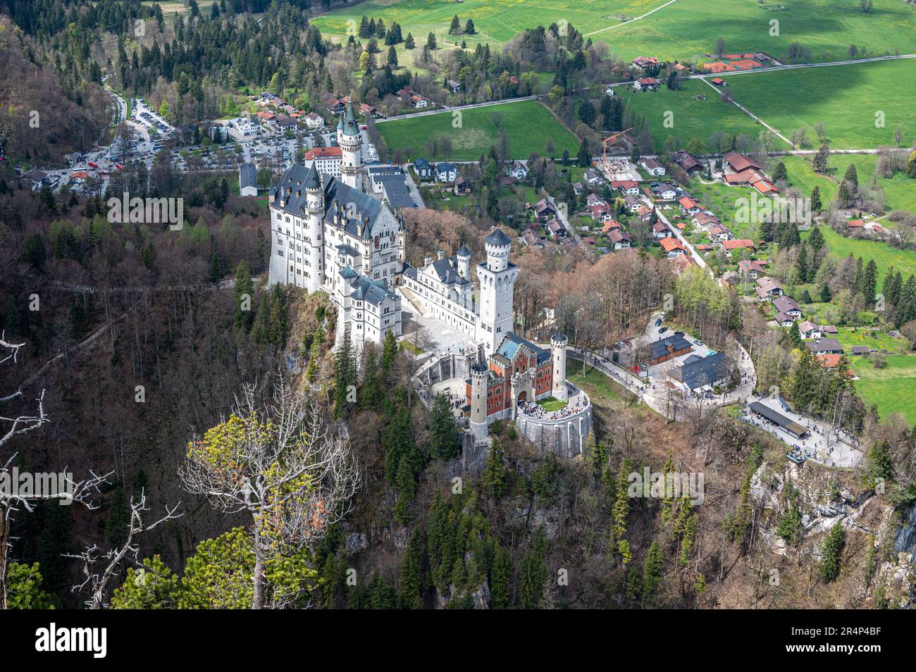 View of Neuschwanstein Castle and Alps valley near Füssen from above ...