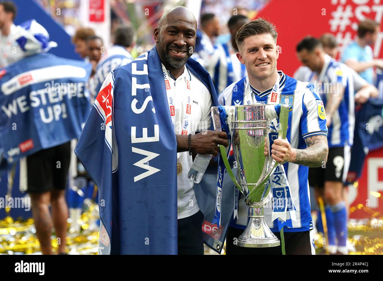 Sheffield Wednesday manager Darren Moore (left) and player Josh Windass ...