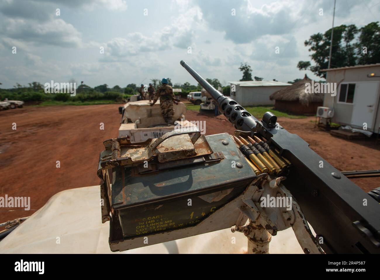 A United Nations peacekeeping convoy operates on a dirt road in DRC ...