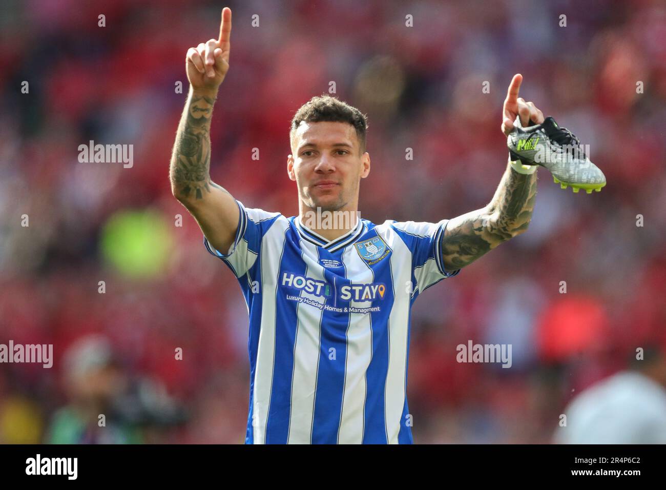 Marvin Johnson #18 of Sheffield Wednesday celebrates their win and ...