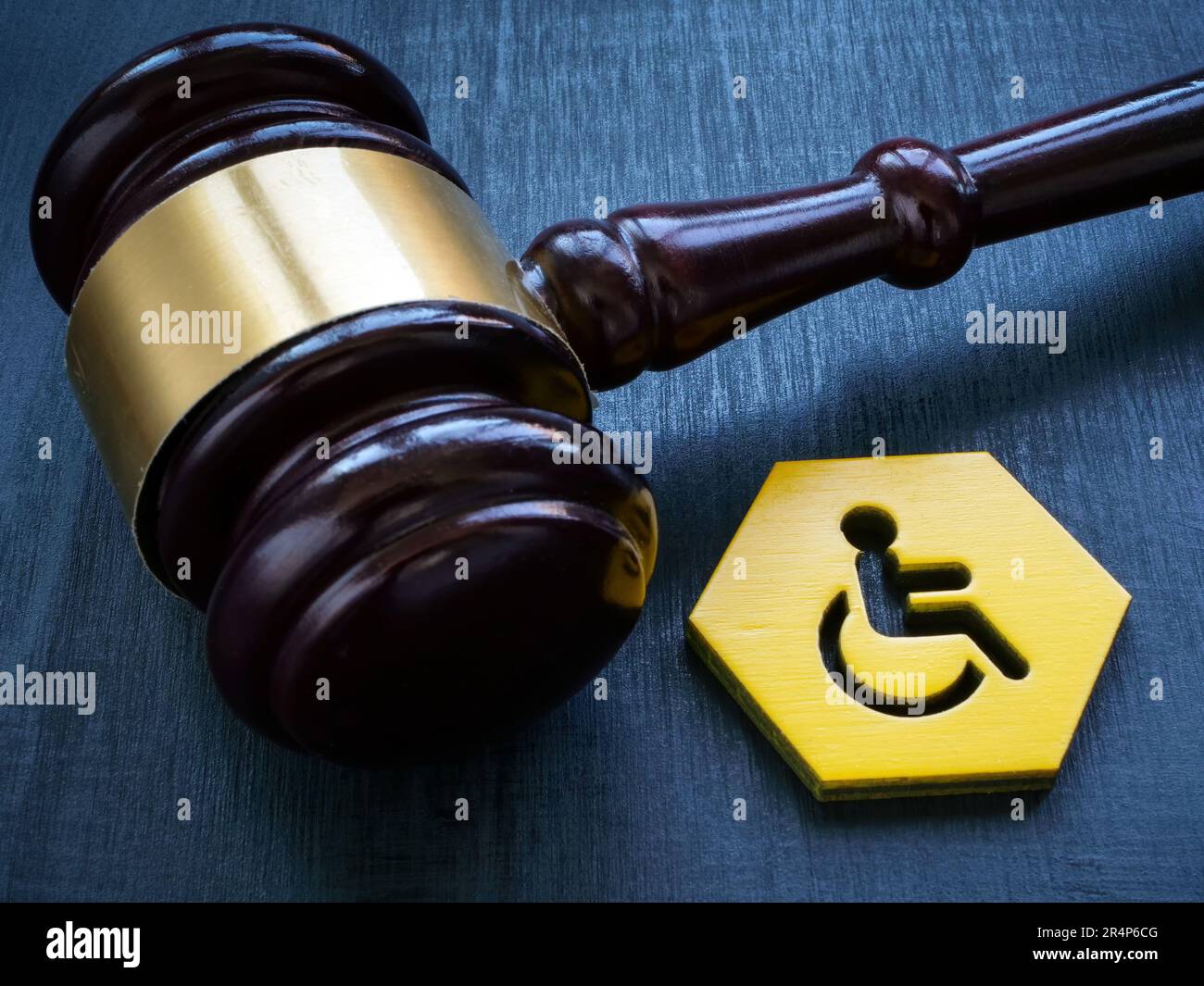 Gavel as symbol of law and disability person sign Stock Photo - Alamy