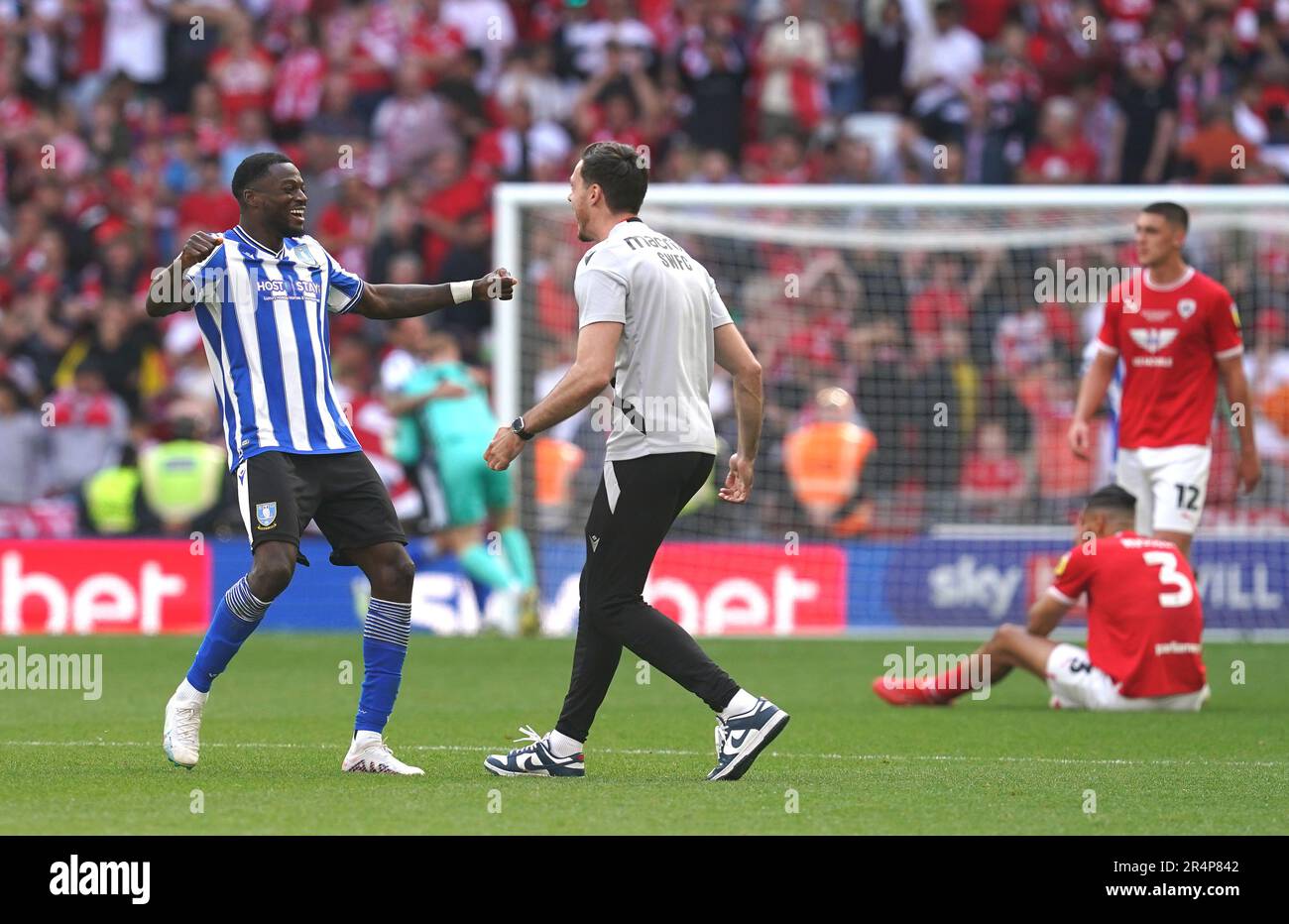 Sheffield Wednesday's Dominic Iorfa (left) celebrates victory and ...