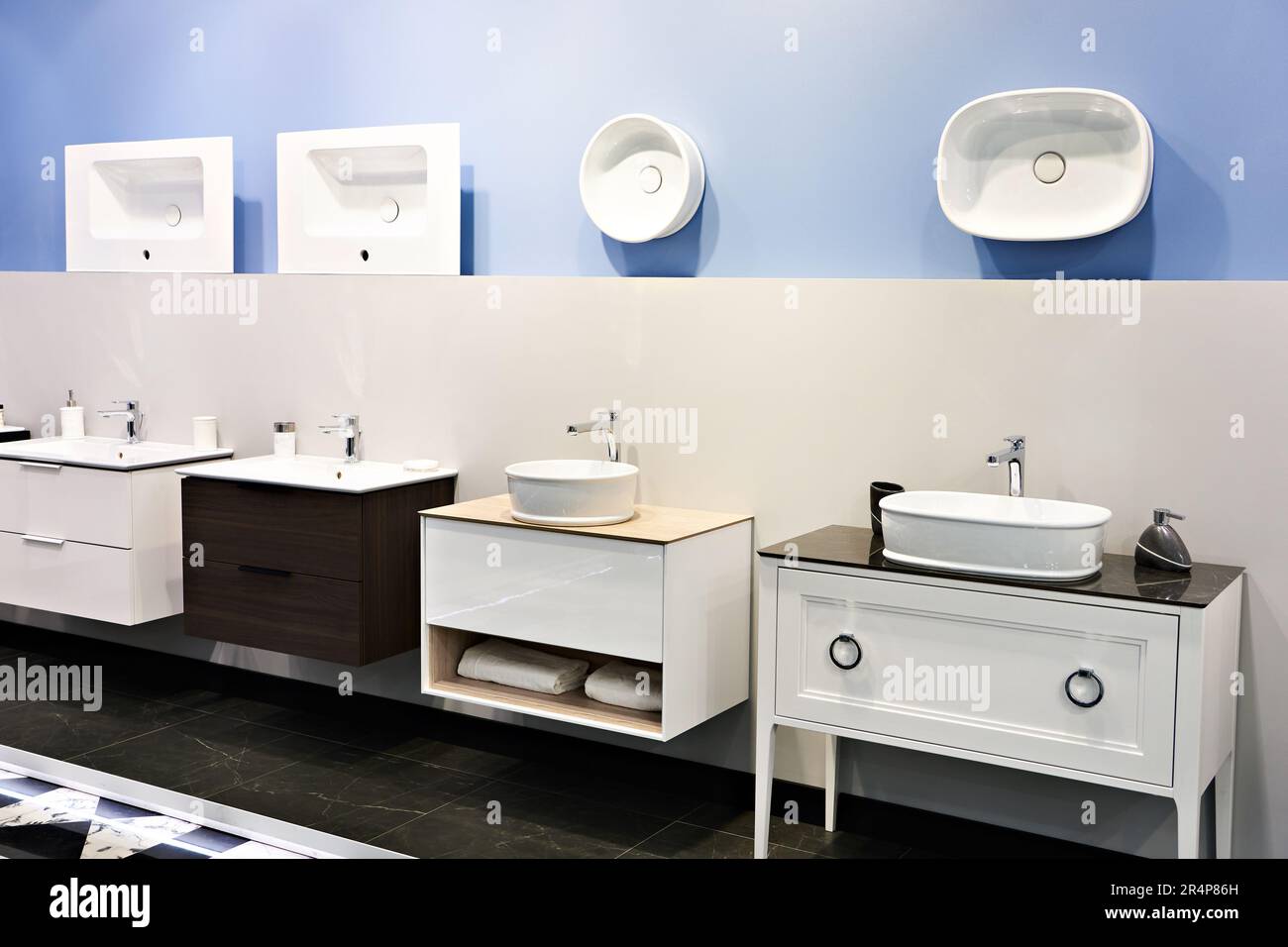 Bathroom sinks and furniture in the store Stock Photo - Alamy