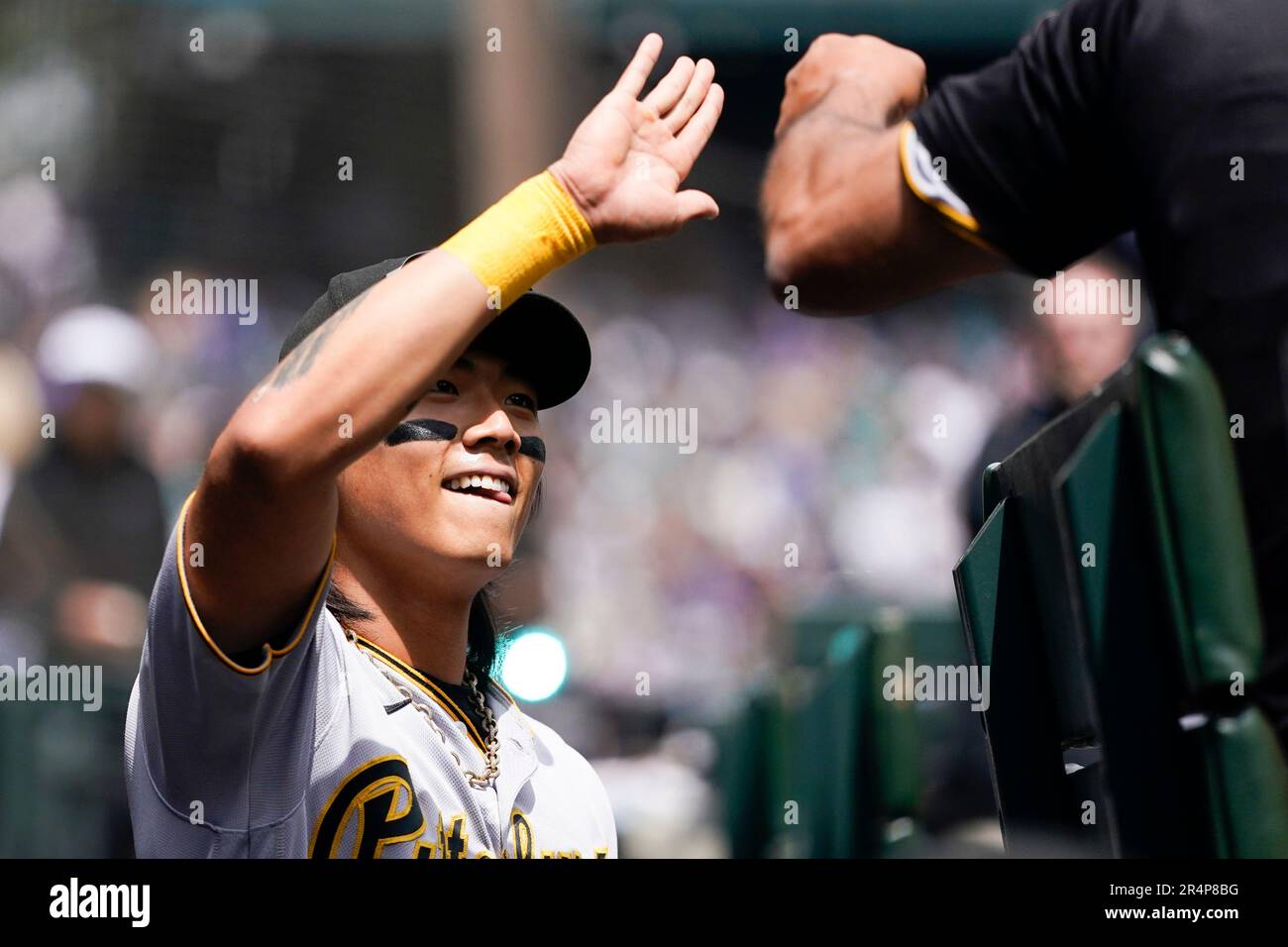 Pittsburgh Pirates second baseman Ji Hwan Bae high-fives a teammate ...