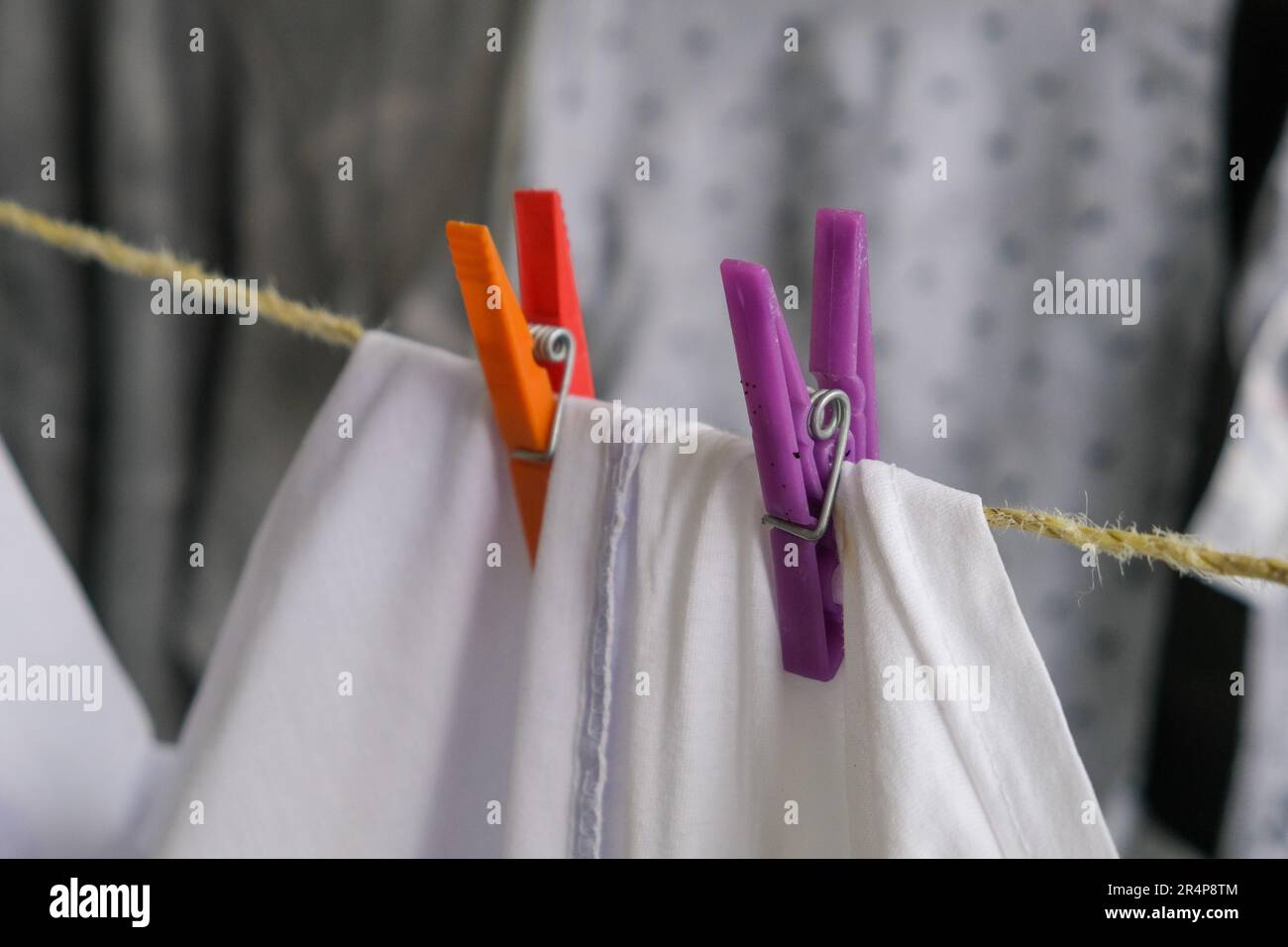 Close up clothespin hanging clothes at rope isolated background Stock ...