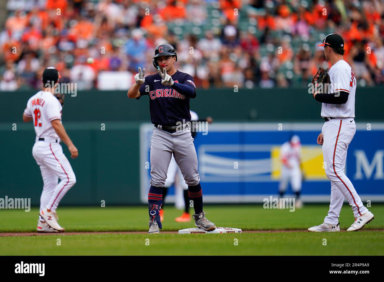 Cleveland Guardians' Will Brennan reacts after hitting a double against ...