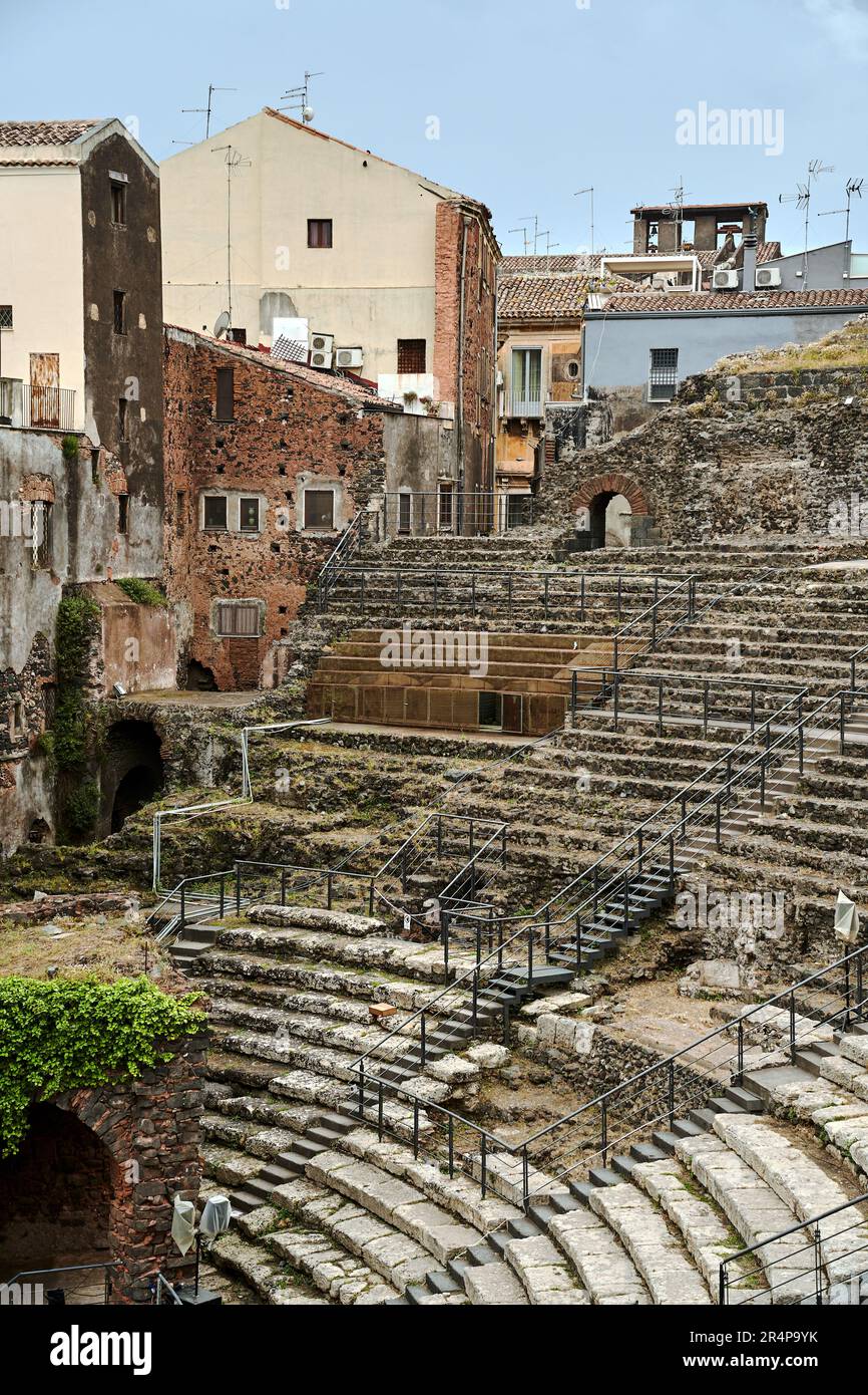 The ruins of an ancient Greek theater and the walls of historic ...