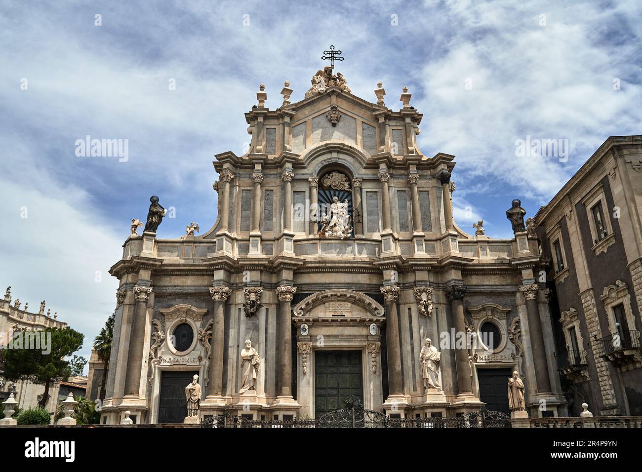 Columns and statues of the Baroque facade of the Cathedral Basilica of ...