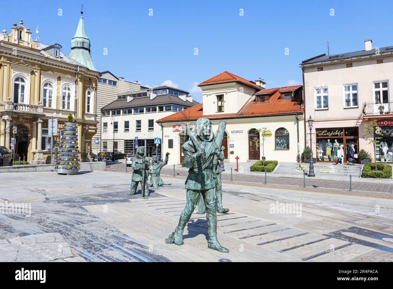 Monument of medieval salt mine worker at the main market square in ...