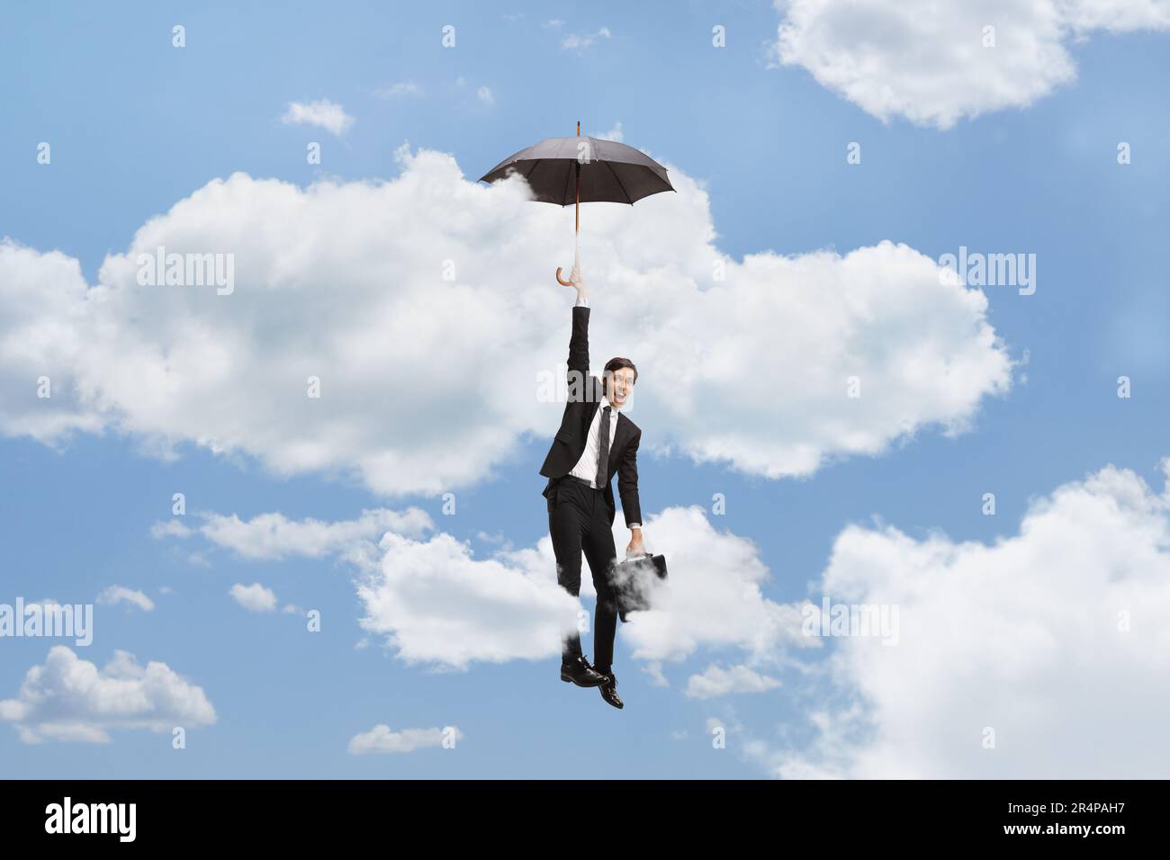 Flying umbrella hi-res stock photography and images - Alamy