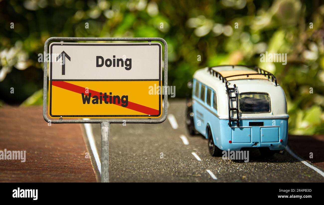 Street Sign the Direction Way to Doing versus Waiting Stock Photo - Alamy