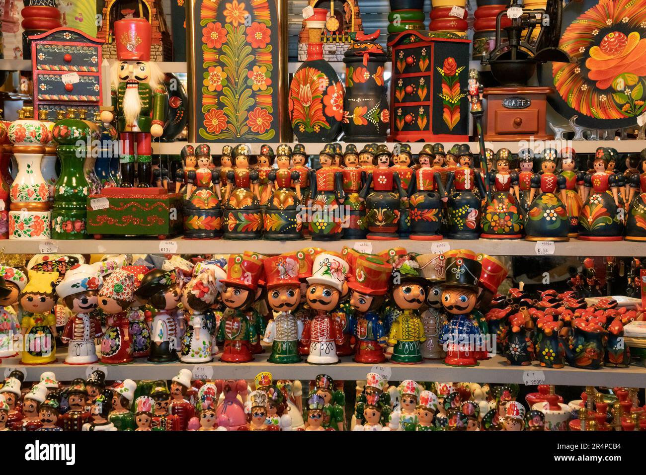 Traditional wooden dolls and woodcraft for sale on a market stall in ...