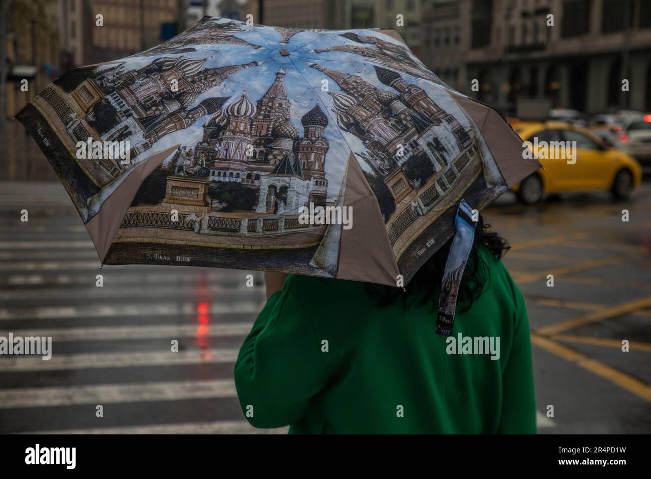 Moscow, Russia. 26th of March, 2023. A woman crosses a pedestrian ...