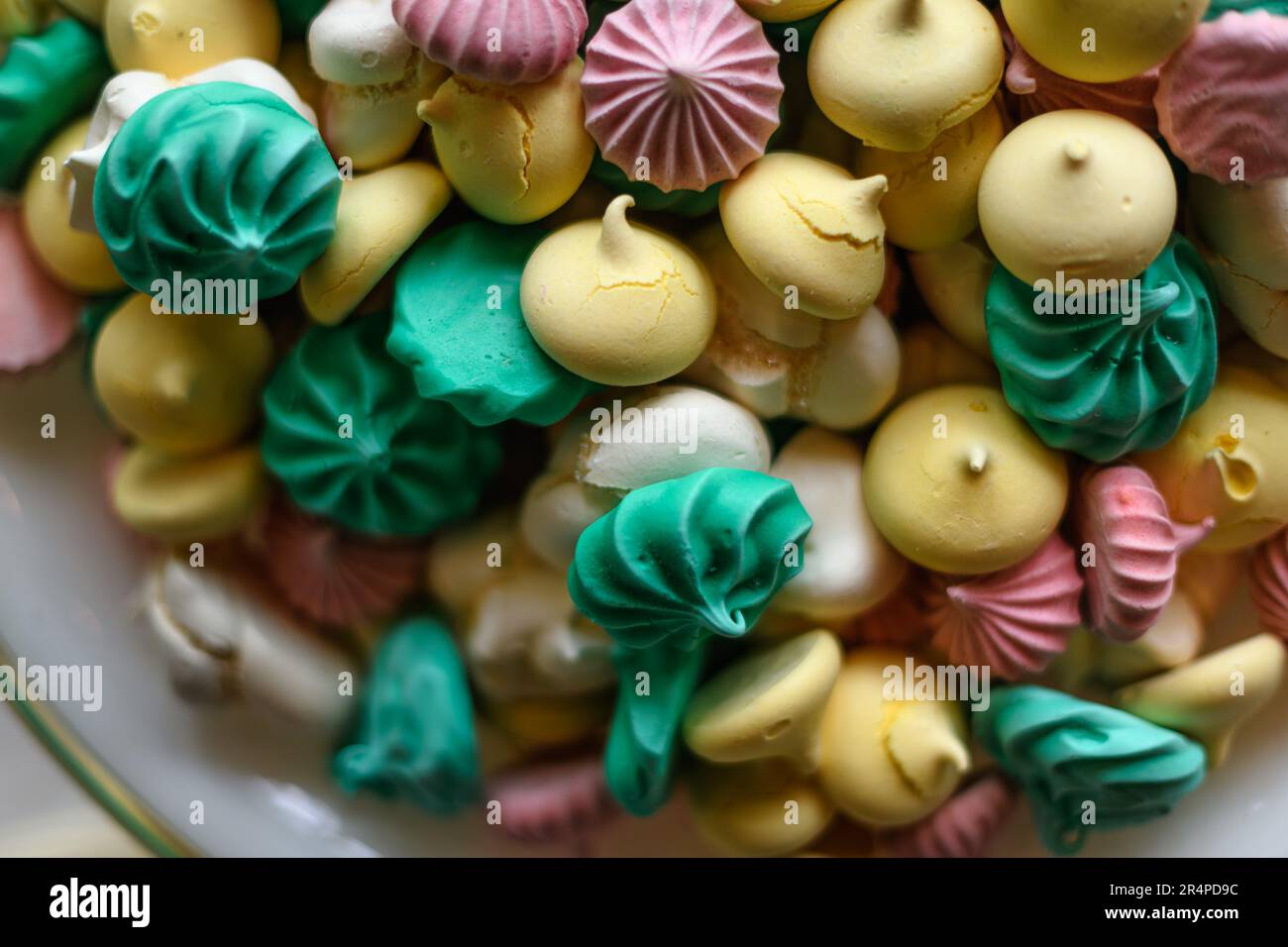 Coloured meringues mixed in a buffet of a. Convention Stock Photo - Alamy