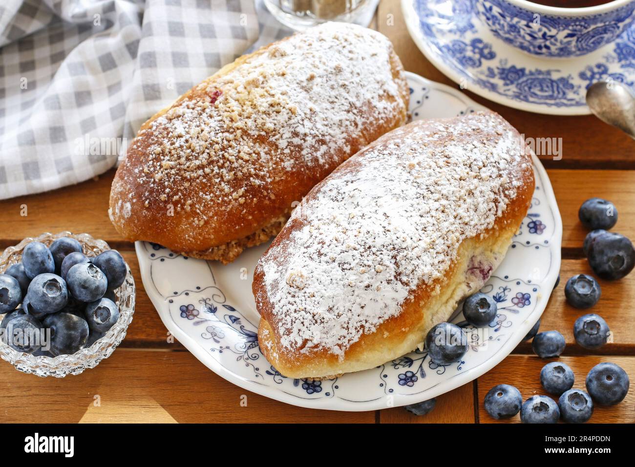 Traditional buns with blueberry filling. Party dessert Stock Photo - Alamy