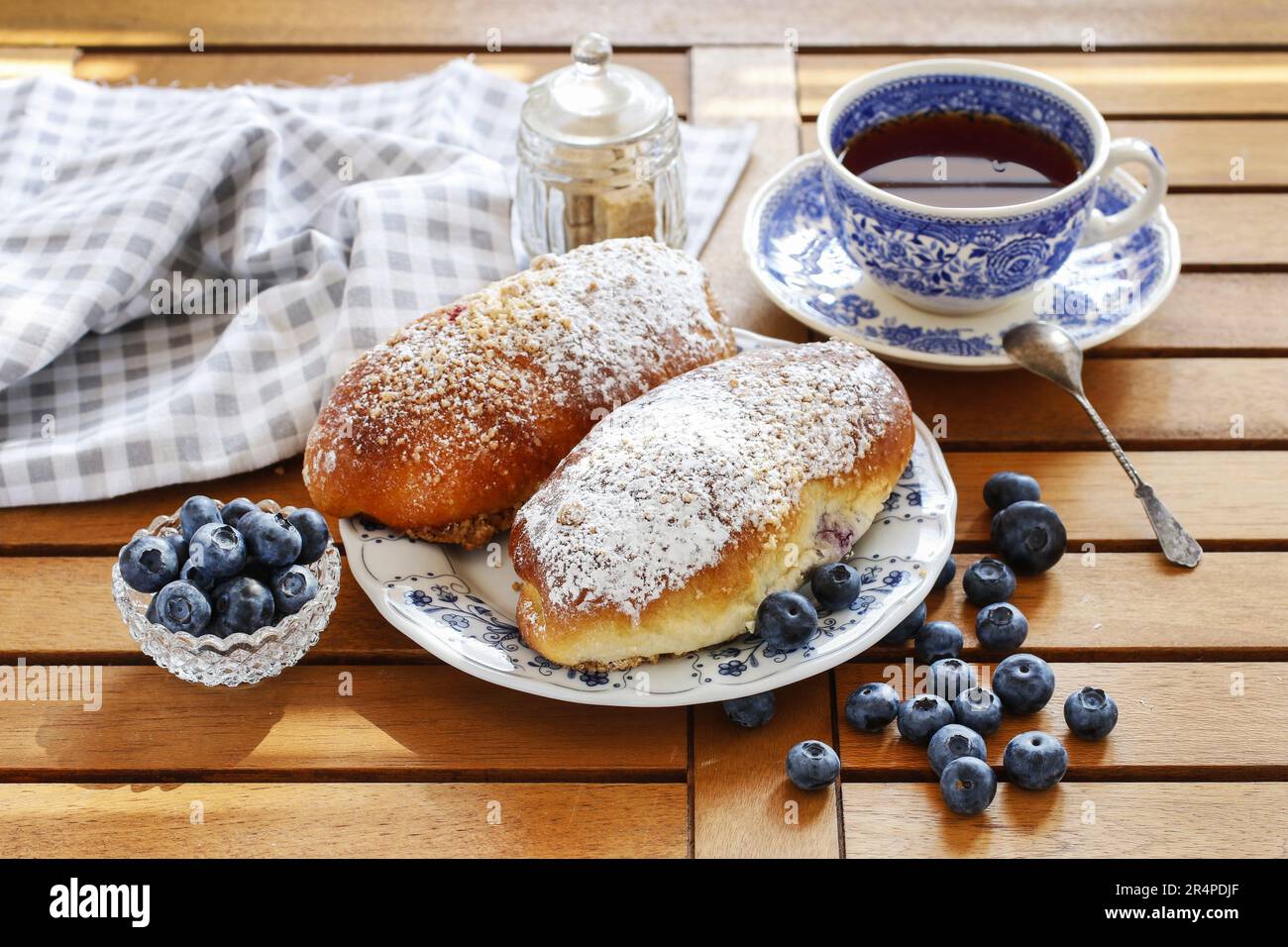 Traditional buns with blueberry filling. Party dessert Stock Photo - Alamy