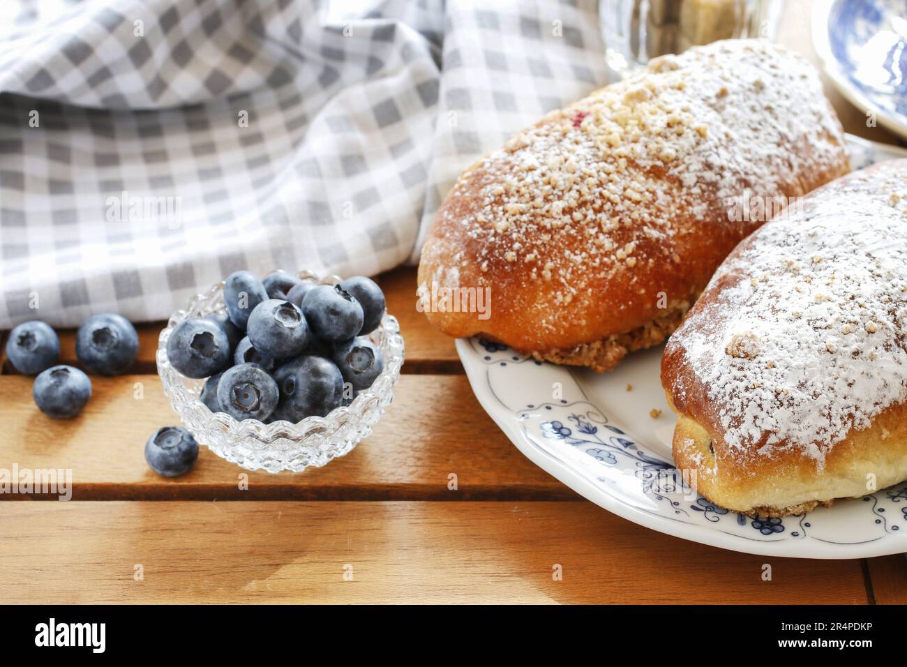 Traditional buns with blueberry filling. Party dessert Stock Photo - Alamy