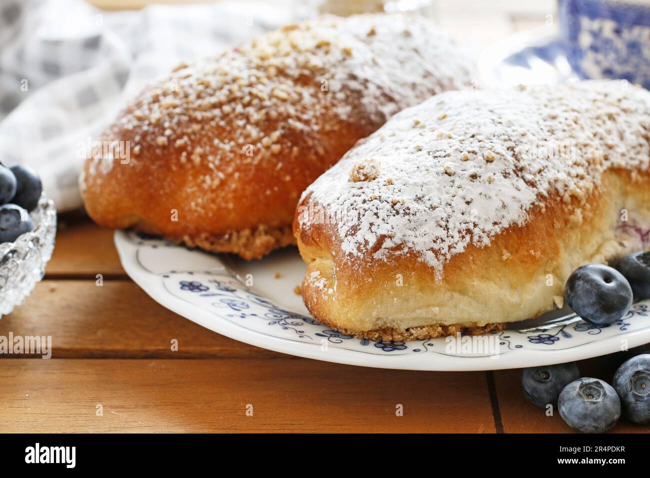 Traditional buns with blueberry filling. Party dessert Stock Photo - Alamy