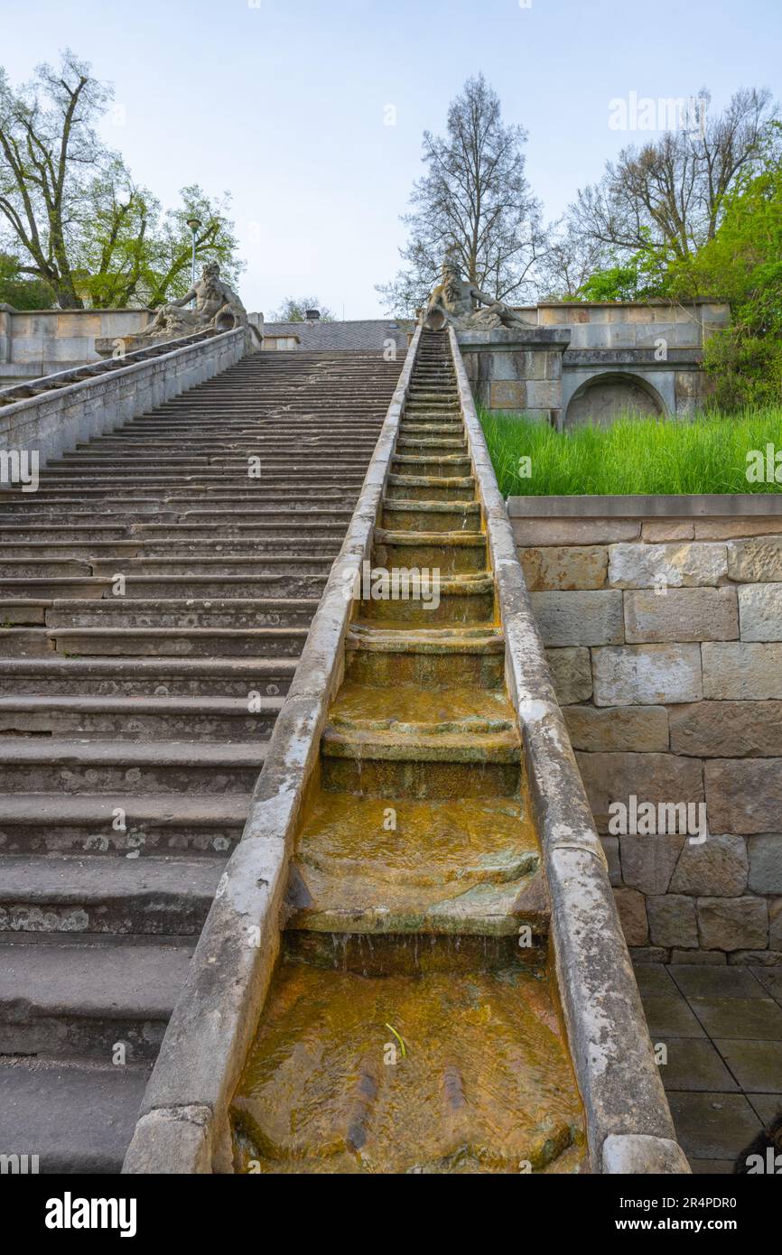 Historical baroque staircase with water cascades on each side and ...