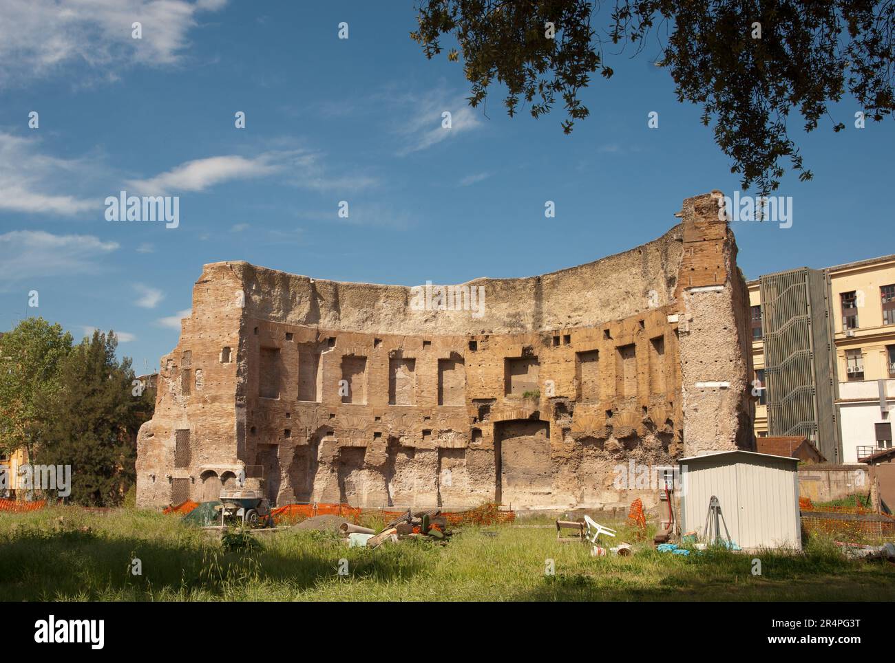 Semi-circular brick ruins of exterior structure of The Baths of Trajan ...
