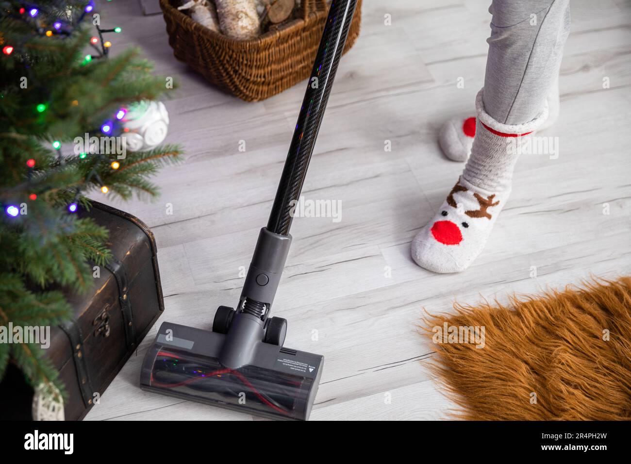 An aerial view while cleaning the floor with a vacuum cleaner in the ...