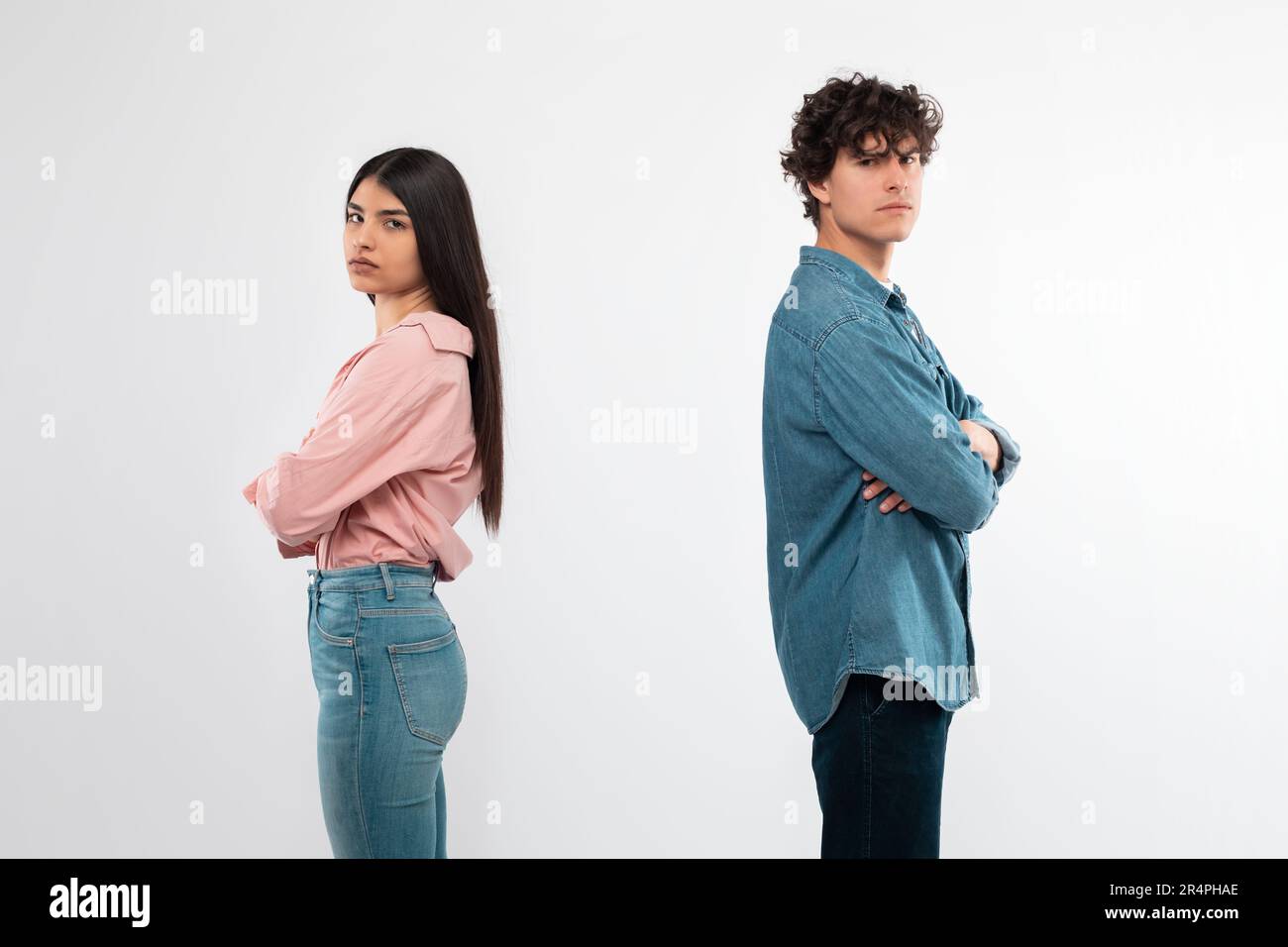 Offended Couple After Conflict Standing Over White Background In Studio ...