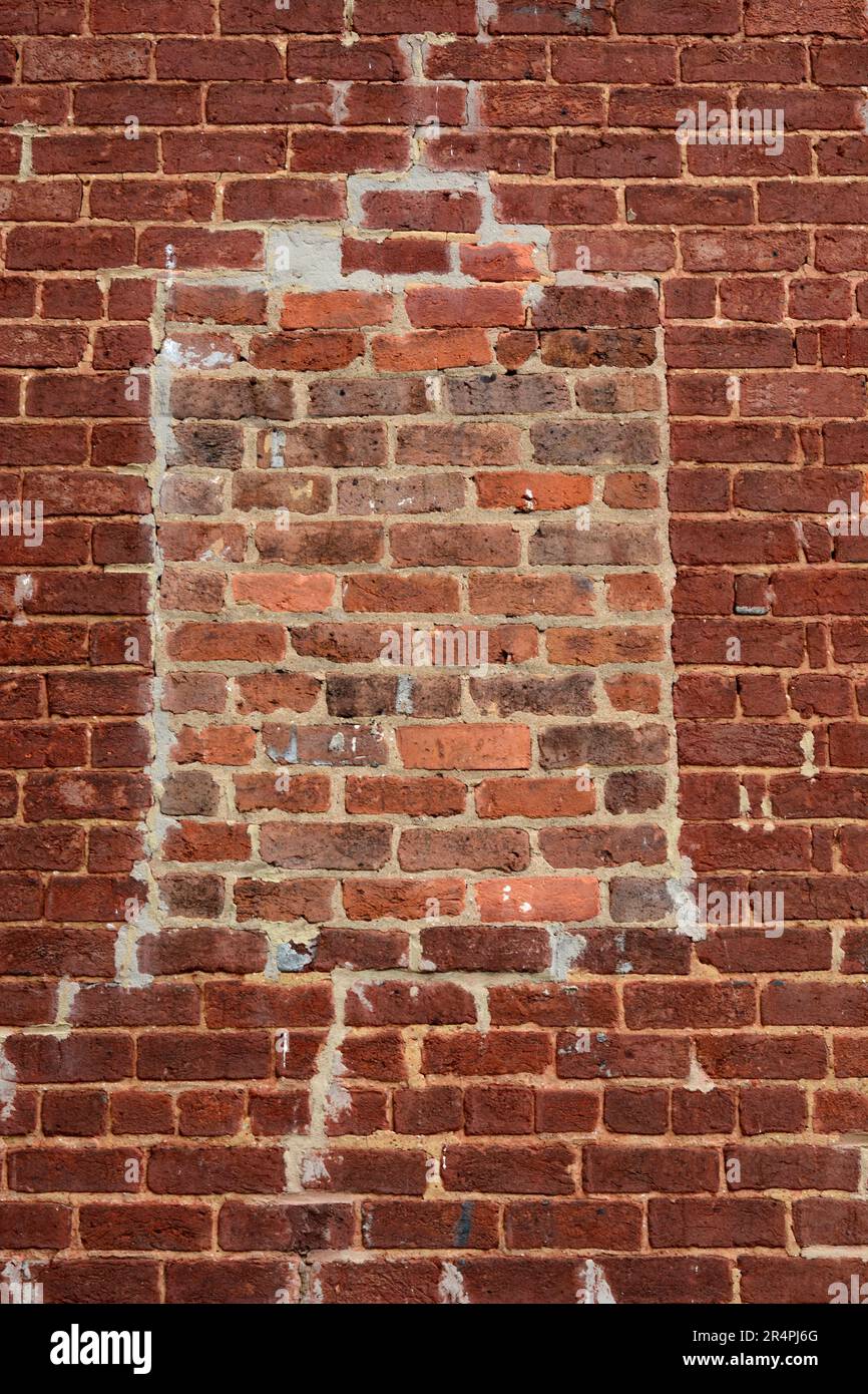 A bricked-up former window opening on the side of a 19th century ...