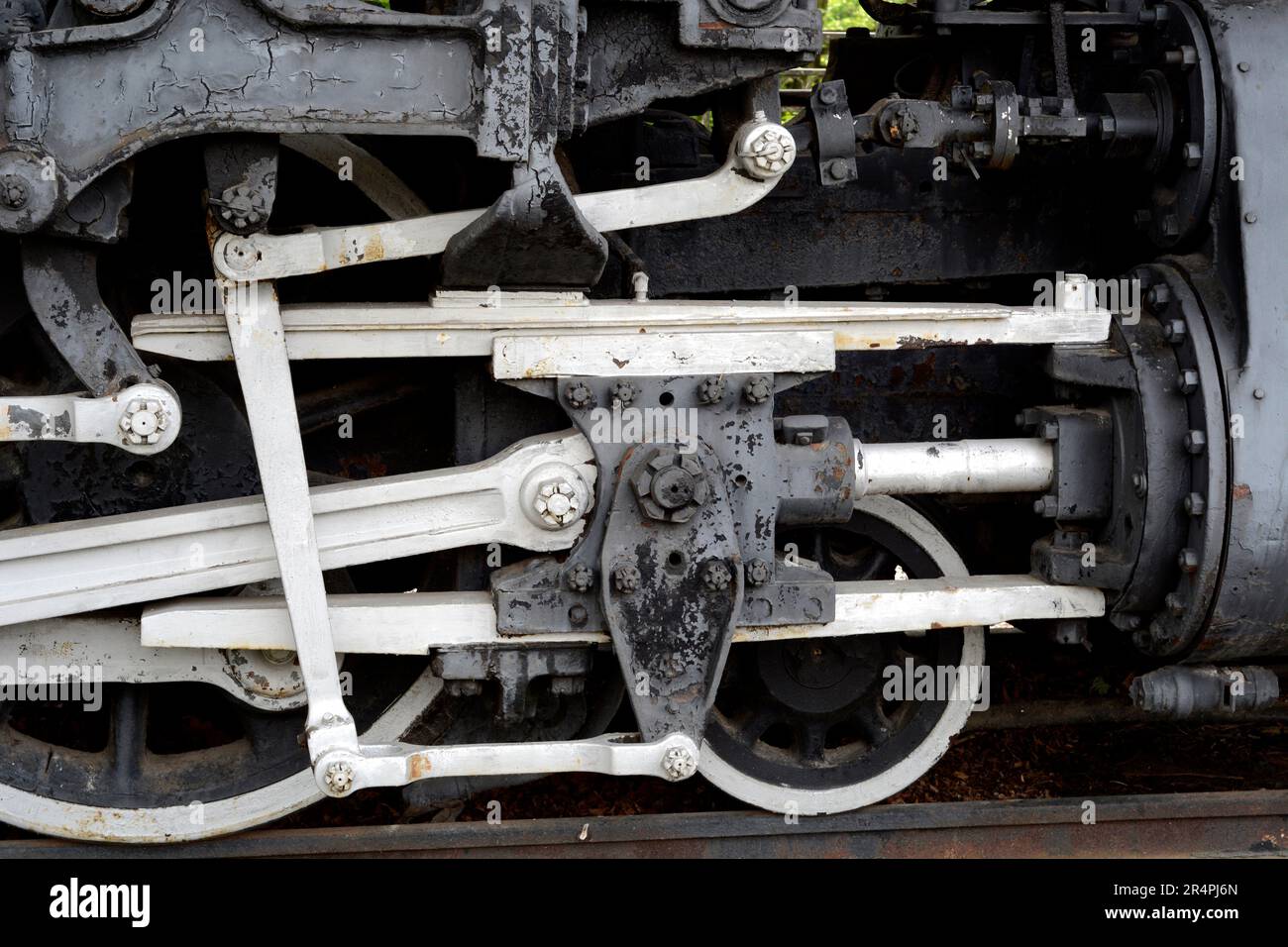 A close up of the driver wheels of a 1901 railroad locomotive on ...