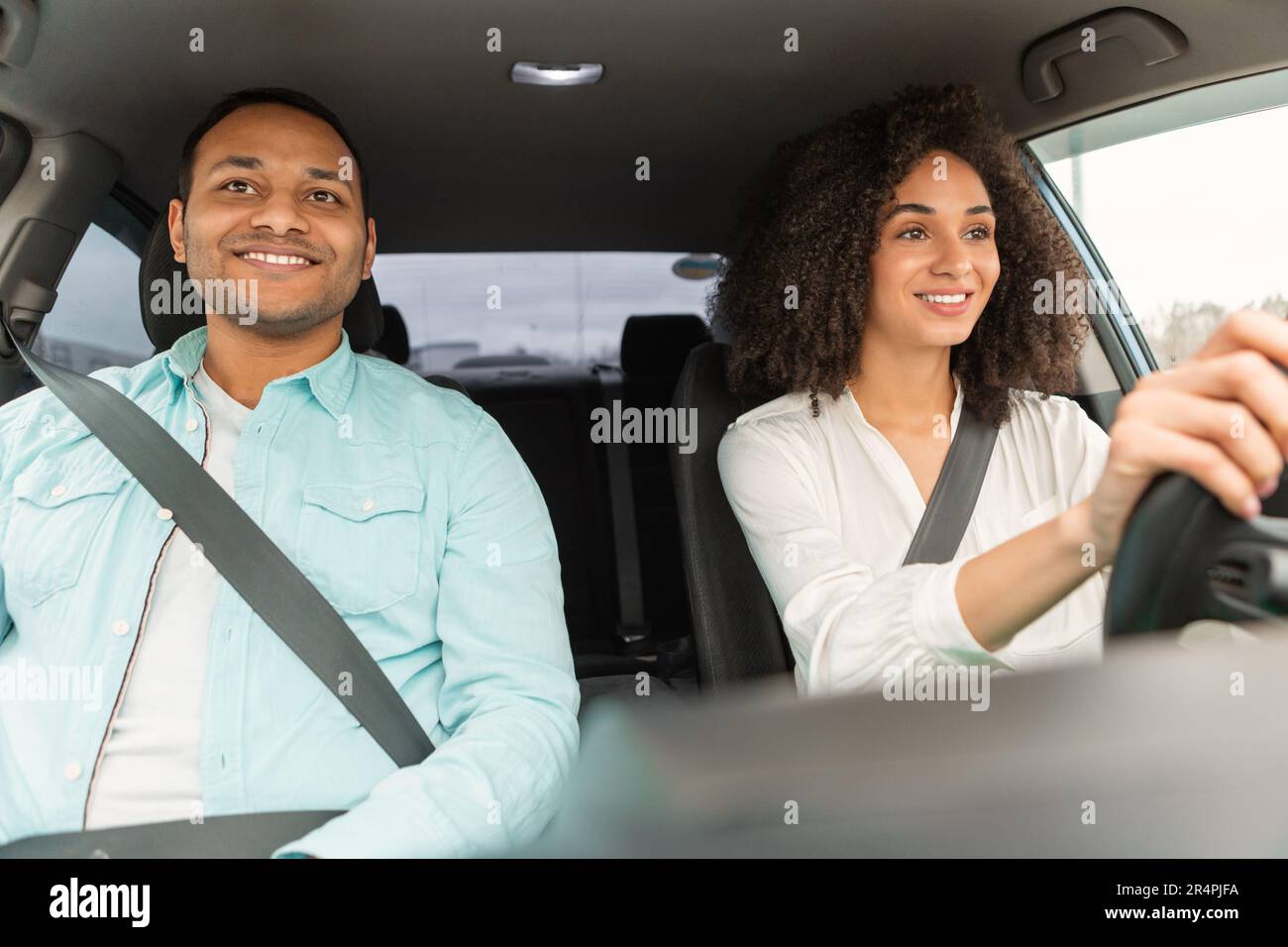 Happy Driving Instructor Teaching Driver Lady To Drive Car Stock Photo ...
