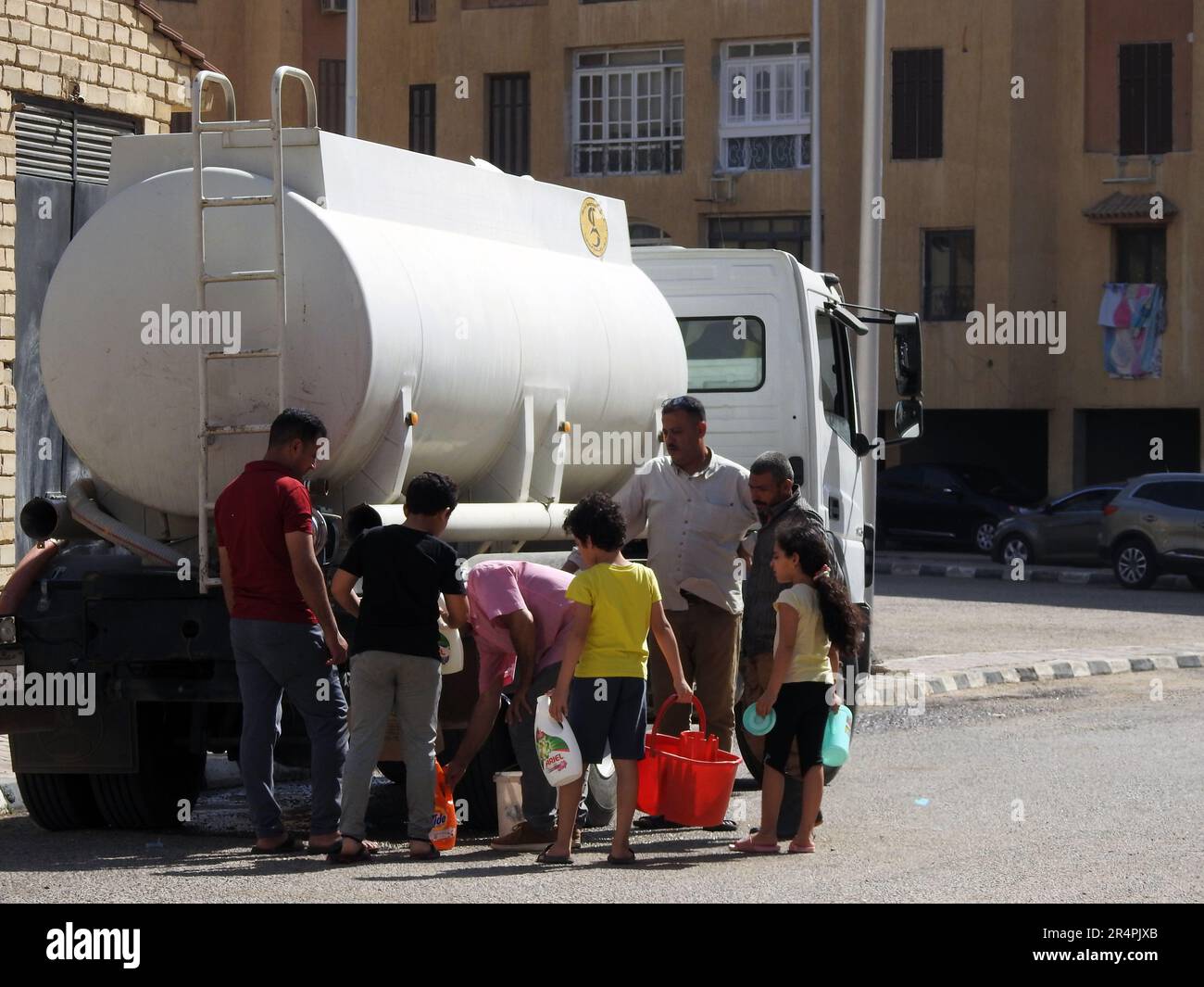 Cairo, Egypt, May 15 2023: A water tanker vehicle with clean water as ...