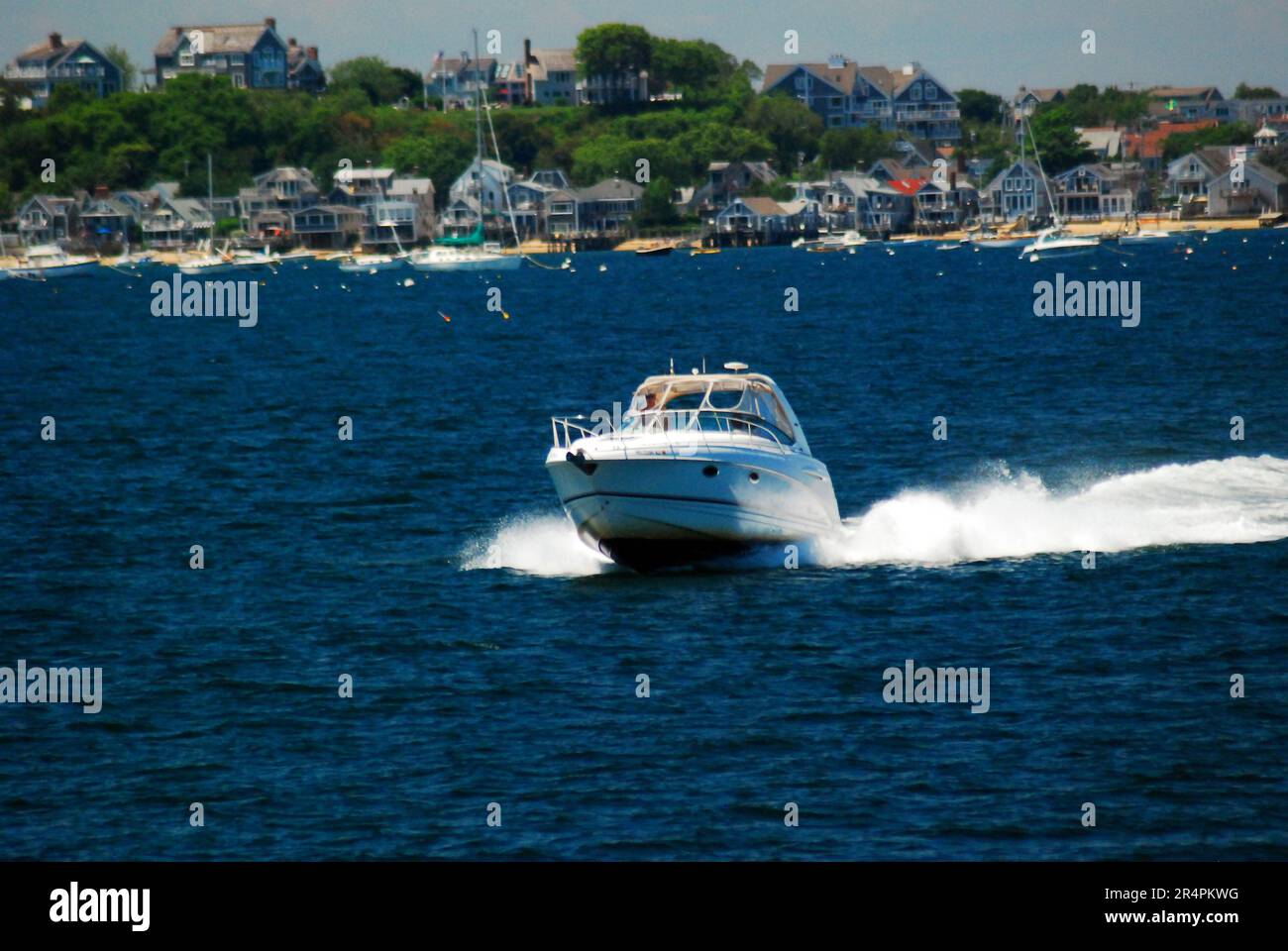 A boat races across the waters near Cape Cod Stock Photo - Alamy