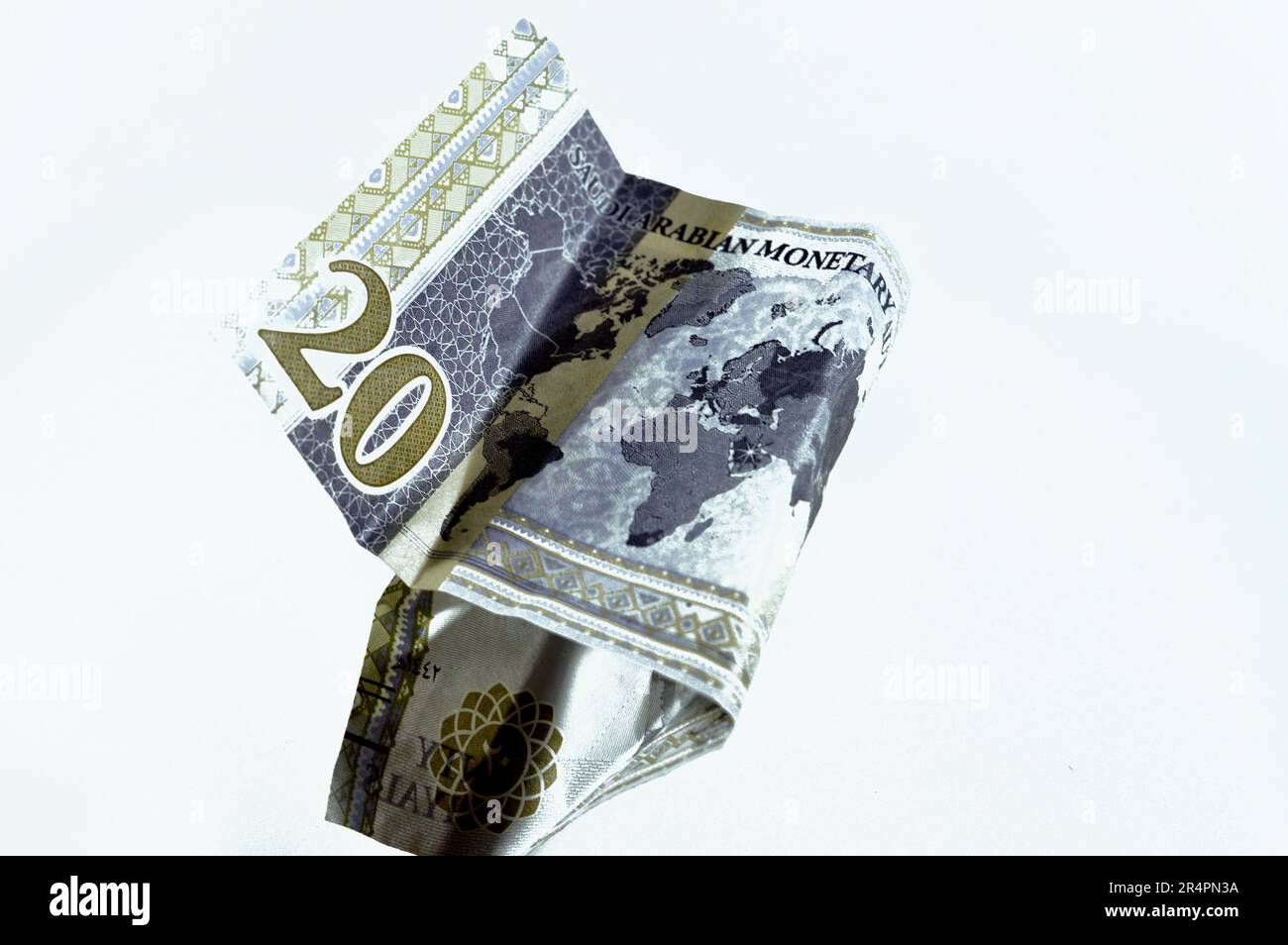 Crumpled Saudi Arabia money of 20 SAR twenty riyals with G20 summit ...