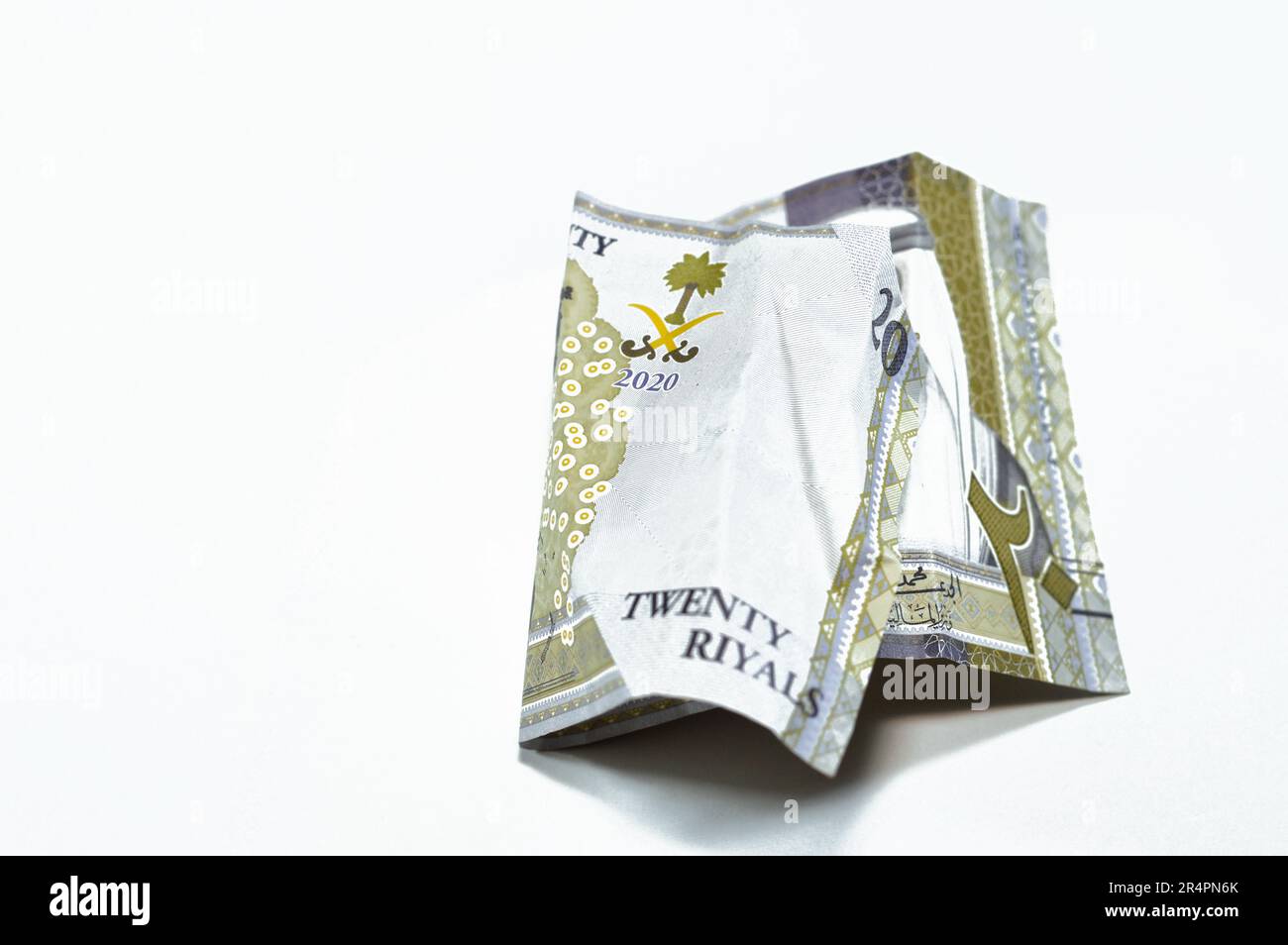 Crumpled Saudi Arabia money of 20 SAR twenty riyals with G20 summit ...