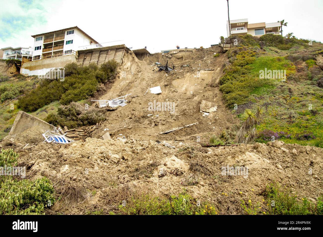 Loosened by heavy rain, a landslide on a cliff hillside in San Clemente ...