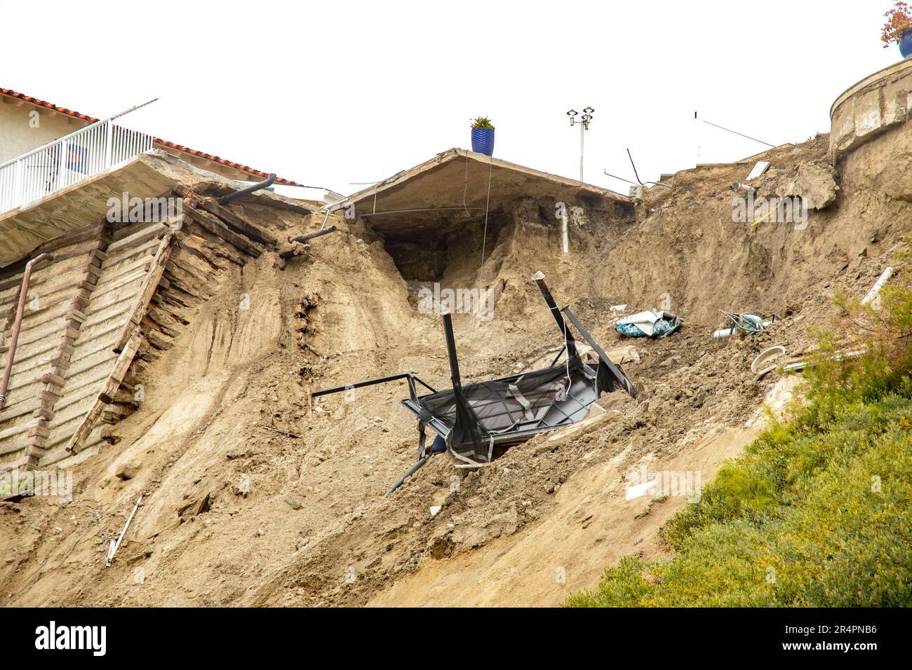 Loosened by heavy rain, a landslide on a cliff hillside in San Clemente ...