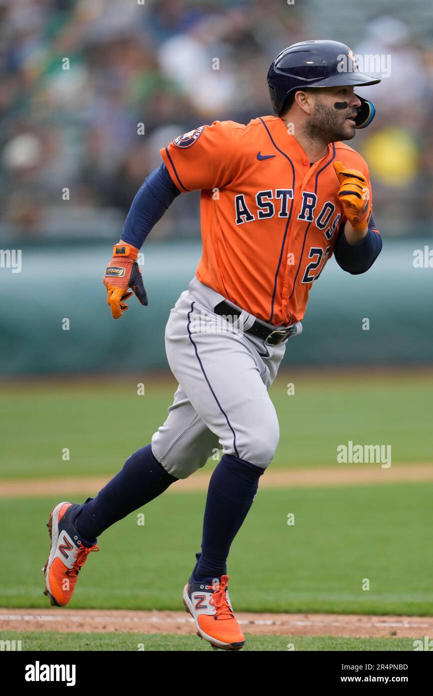 Houston Astros' Jose Altuve after hitting a home run during a baseball ...
