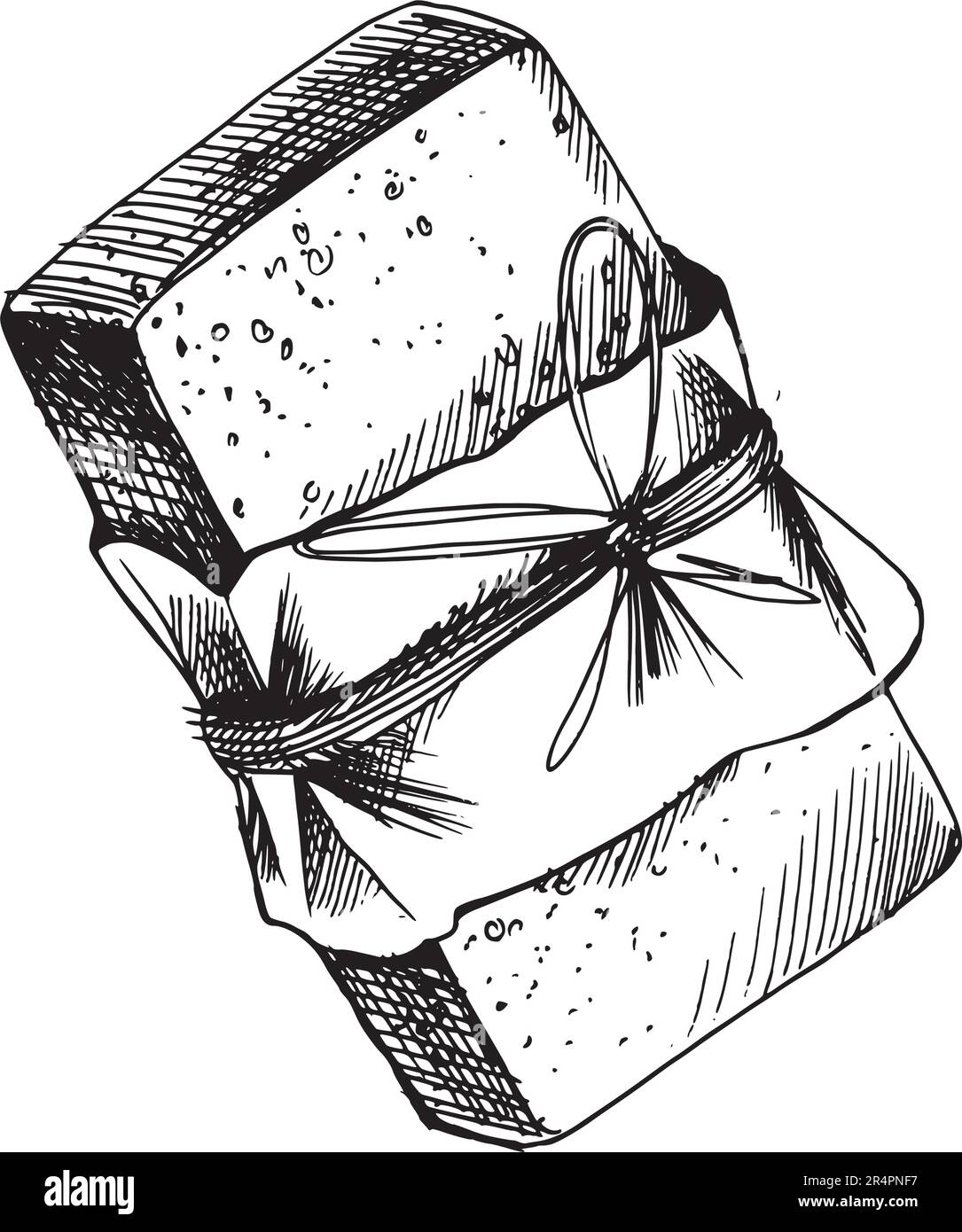 A bar of handmade soap wrapped in craft paper and jute rope. The ...