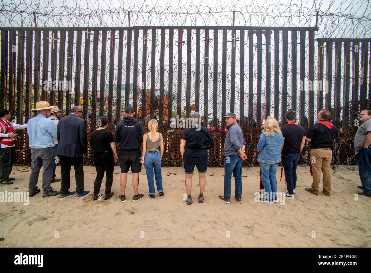 At Border Field Park near San Diego, multiracial demonstrators gather ...