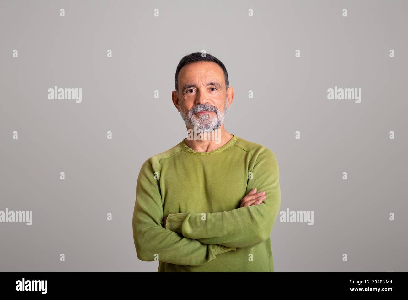 Happy confident old european man with crossed arms on chest look at ...