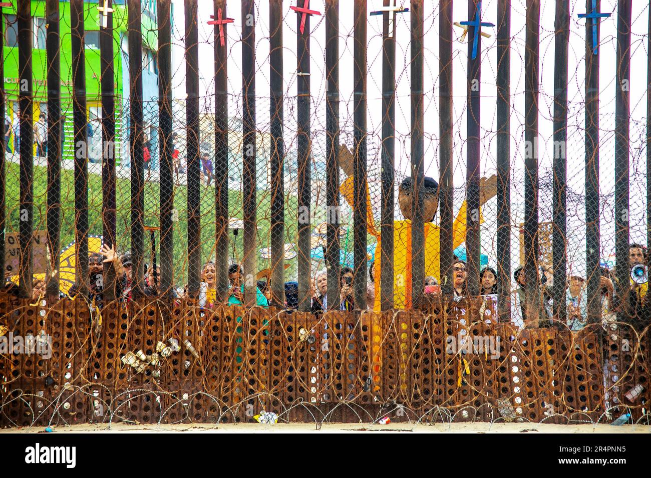 At the US/Mexico border, an iron fence and razor wire separates Tijuana ...