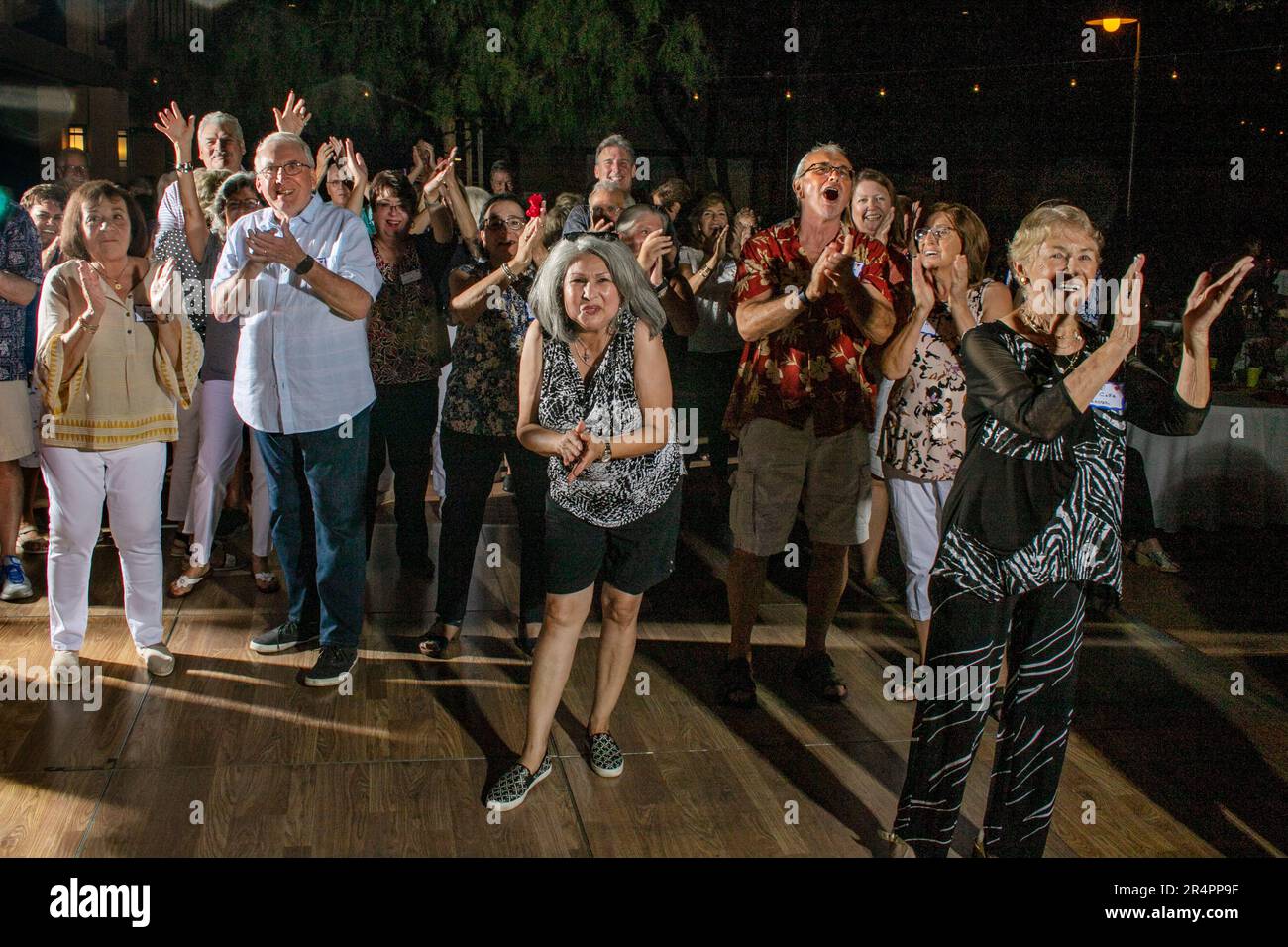 Parishioners at a Southern California Catholic church dance at a summer ...