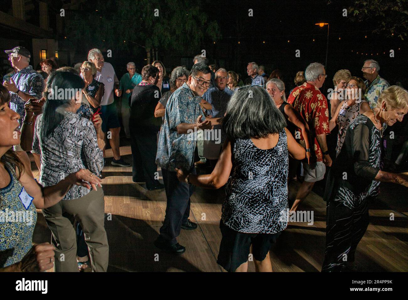 Parishioners at a Southern California Catholic church dance at a summer ...