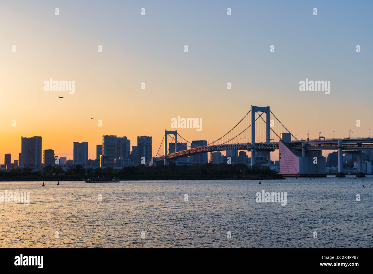 picture of the Rainbow Bridge in Tokyo, Japan, at sunset Stock Photo ...