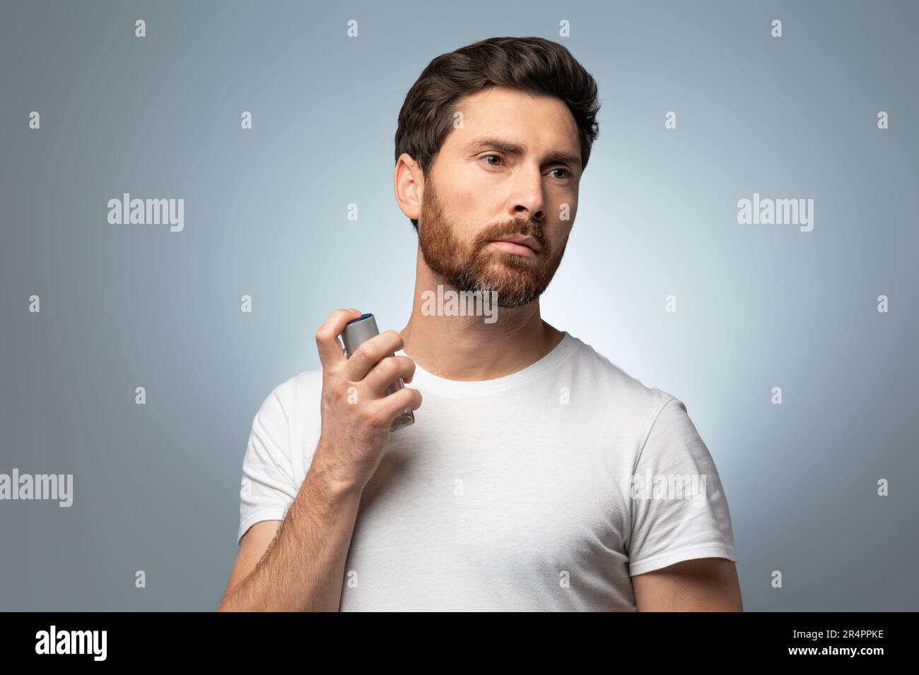 Man applying cologne hi-res stock photography and images - Alamy