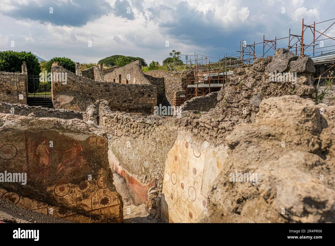 walls frescoed with mythological scenes near an atrium, notably Apollo ...