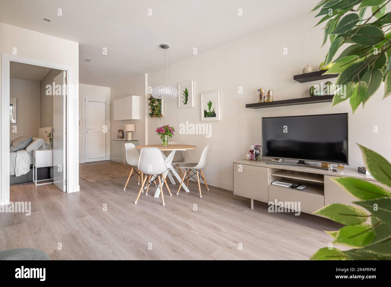 Modern interior in compact apartment with a spacious combined living ...