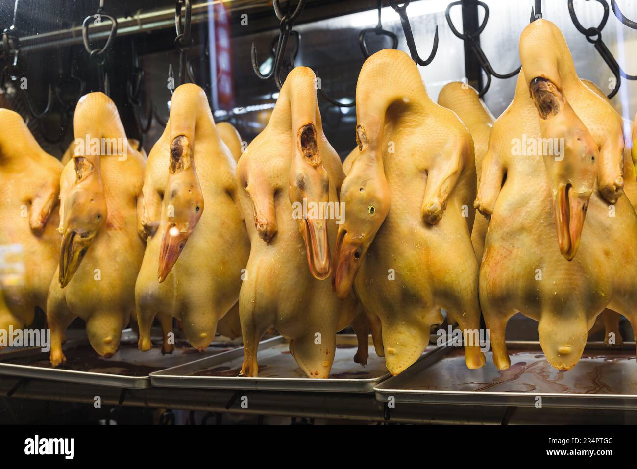 picture of roast ducks Ducks hanging from hooks at a Chinese restaurant ...