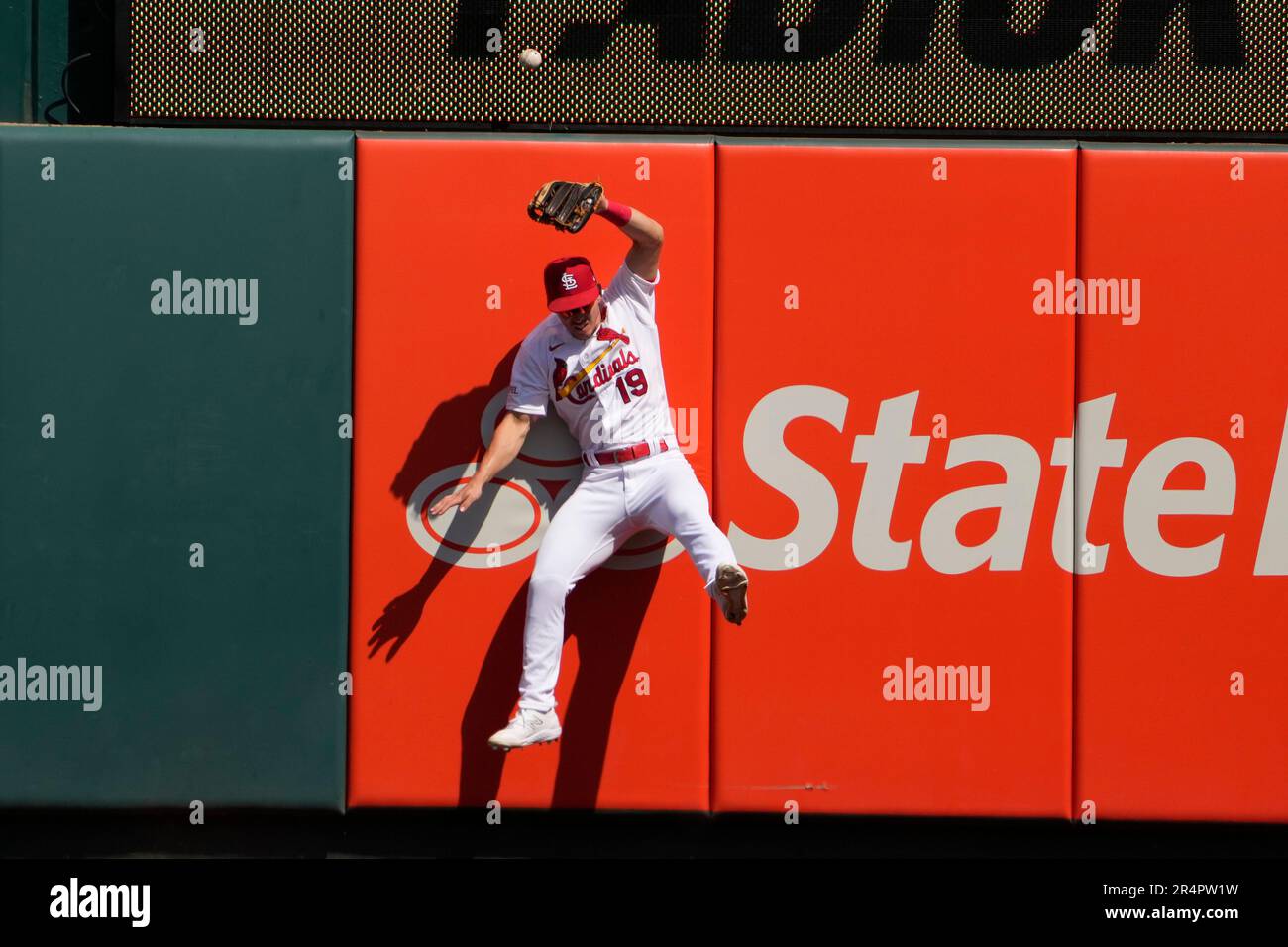 St. Louis Cardinals right fielder Tommy Edman is unable to catch a two ...